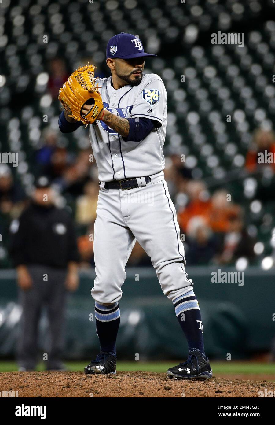 Tampa Bay Rays relief pitcher Sergio Romo prepares to throw to the ...