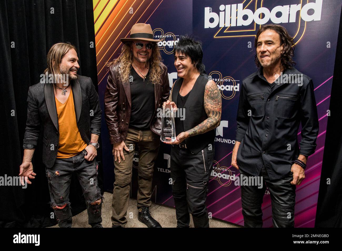 The band Mana poses with the lifetime achievement award at the Latin ...