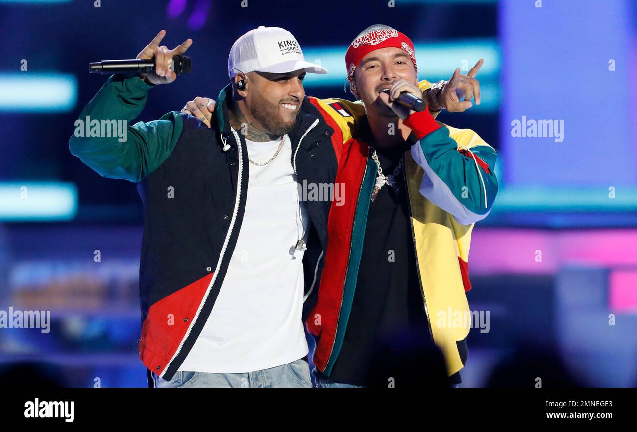 Nicky Jam, left, and J Balvin perform "X (Equis)" at the Billboard ...