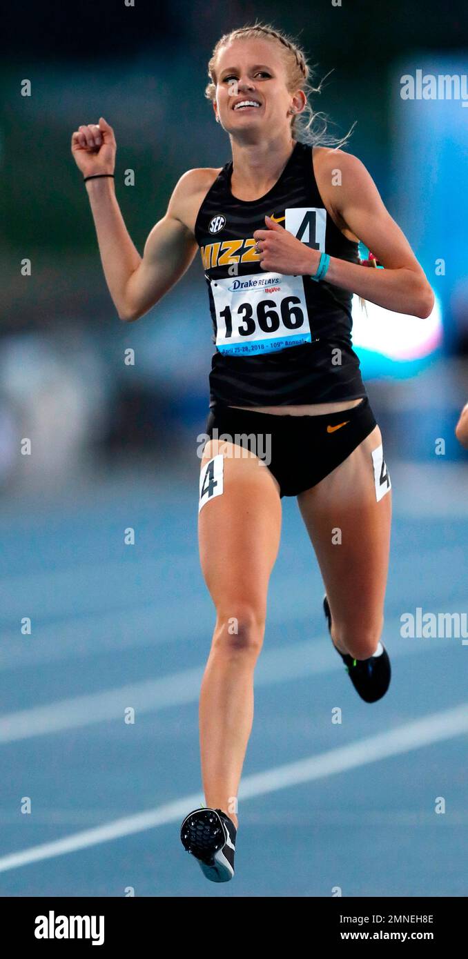 Missouri's Karissa Schweizer reacts as she wins the women's 5,000 ...