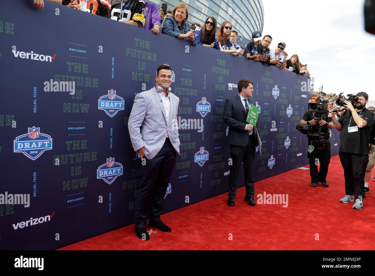 Texas's Connor Williams poses for photos on the red carpet before the ...