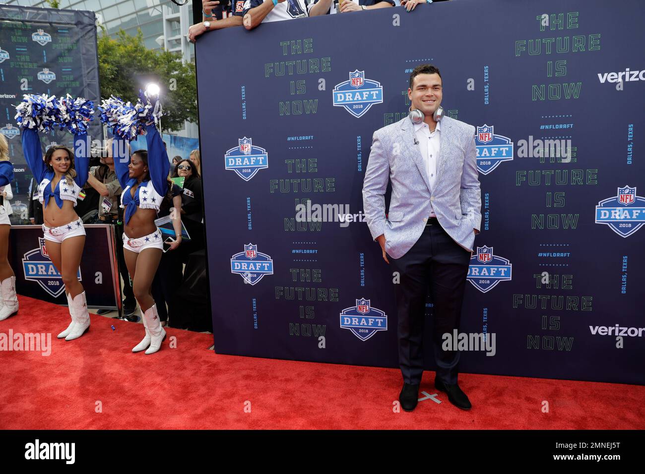 Texas's Connor Williams poses for photos on the red carpet before the ...