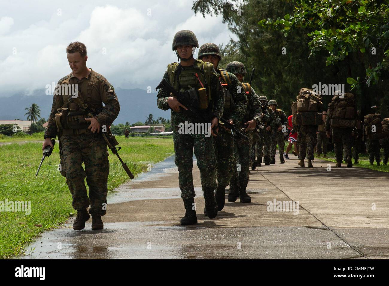 U.S. Marine Corps Staff Sgt. Landon Shaw (left), a Joint Terminal ...