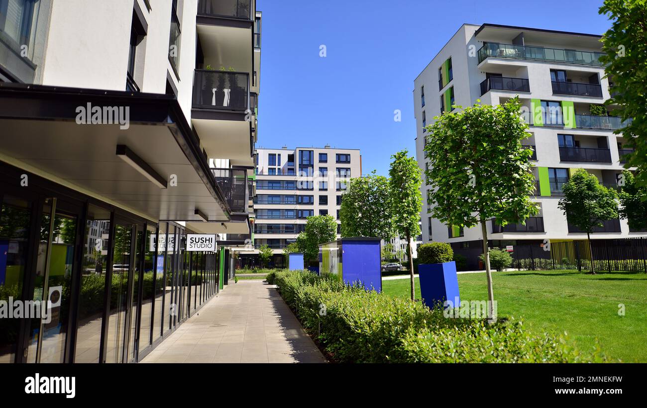 Futuristic square architecture of apartment building. Real estate with ...