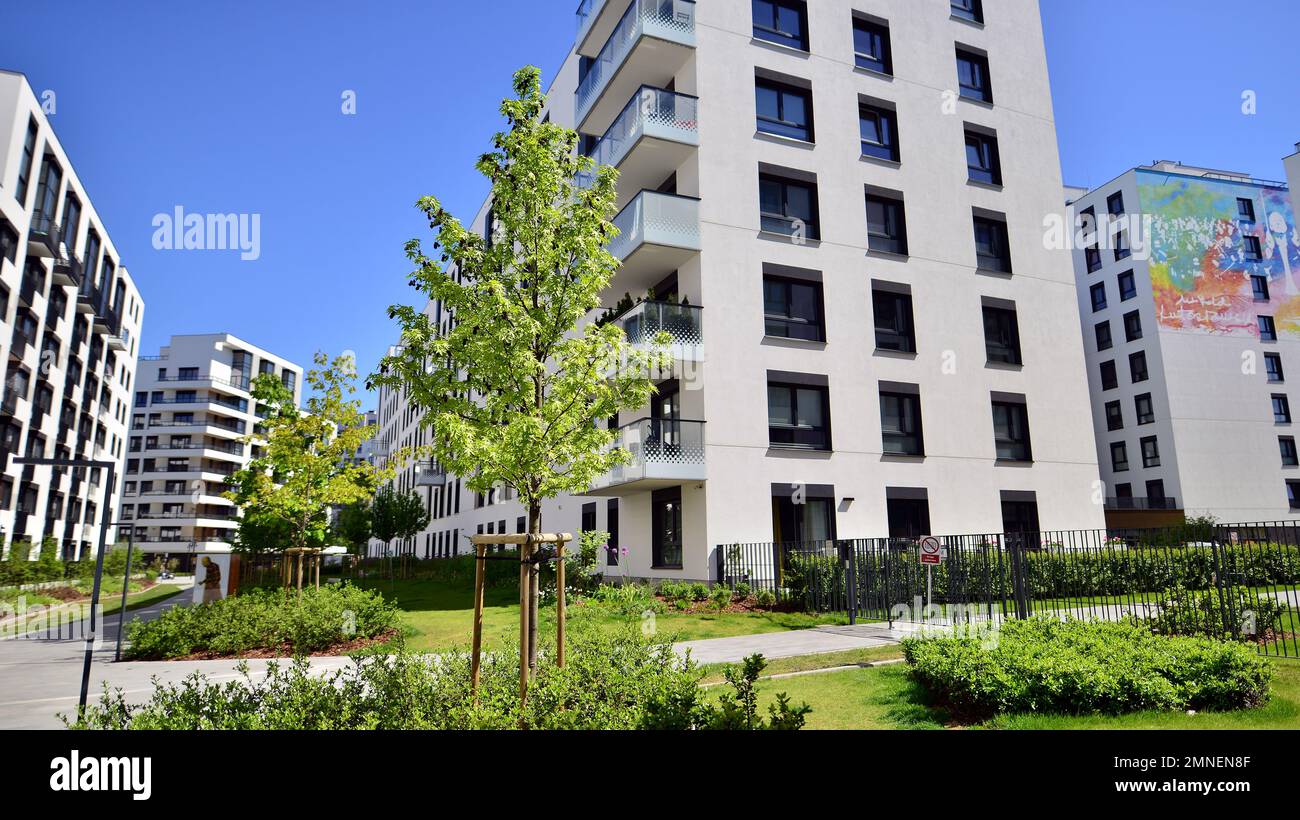 Futuristic square architecture of apartment building. Real estate with ...