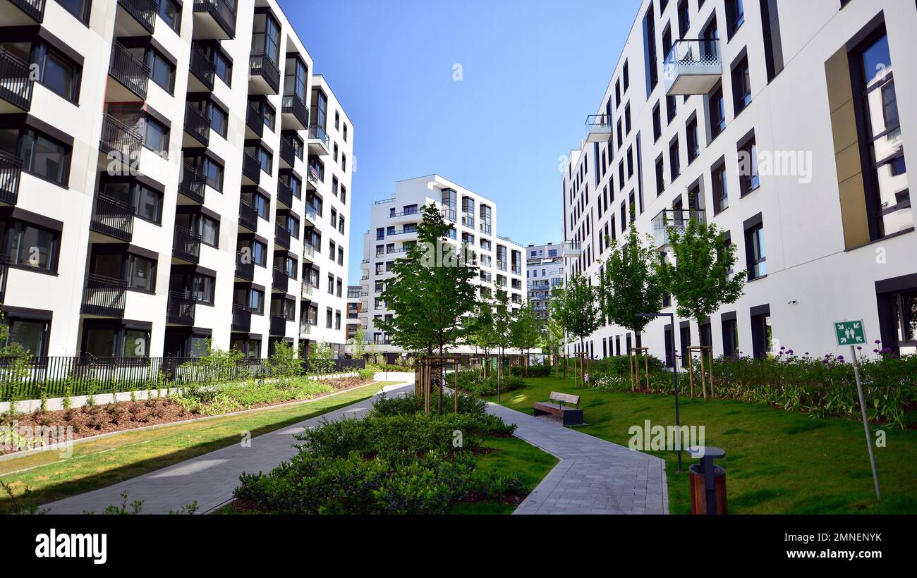 Futuristic square architecture of apartment building. Real estate with ...