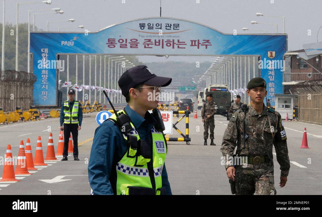 South Korea army soldiers patrol at Unification Bridge, which leads to ...