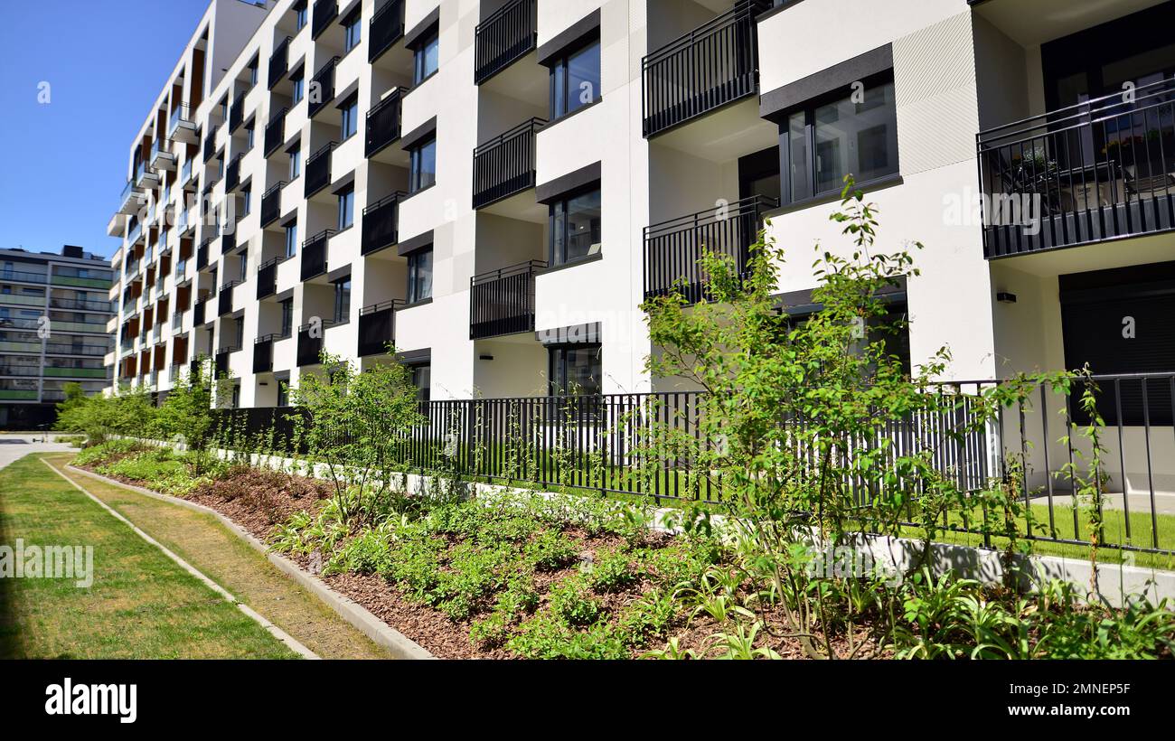 Futuristic square architecture of apartment building. Real estate with ...