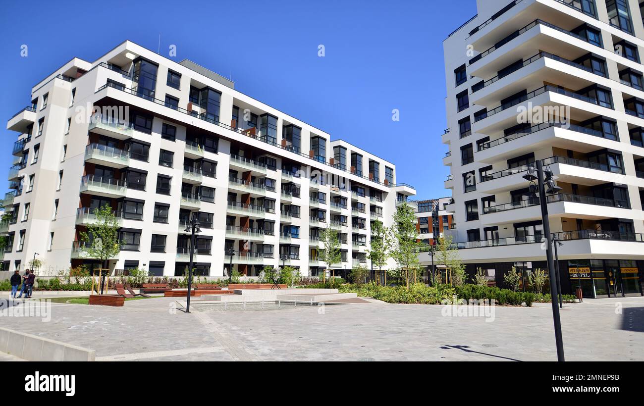 Futuristic square architecture of apartment building. Real estate with ...