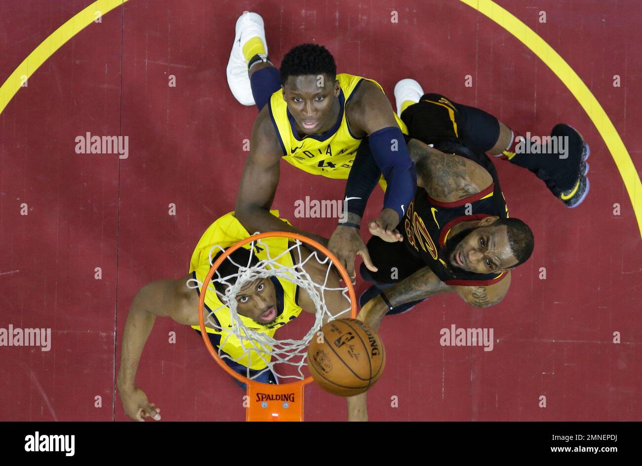 Cleveland Cavaliers' LeBron James, right, and Indiana Pacers' Thaddeus ...