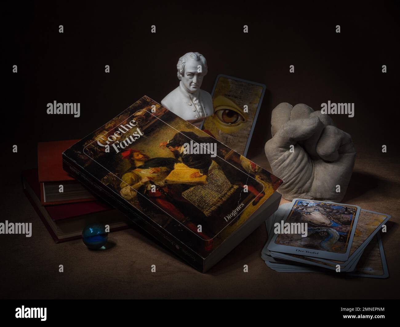 Still life with books, glass ball, tarot cards, Goethe bust and the ...