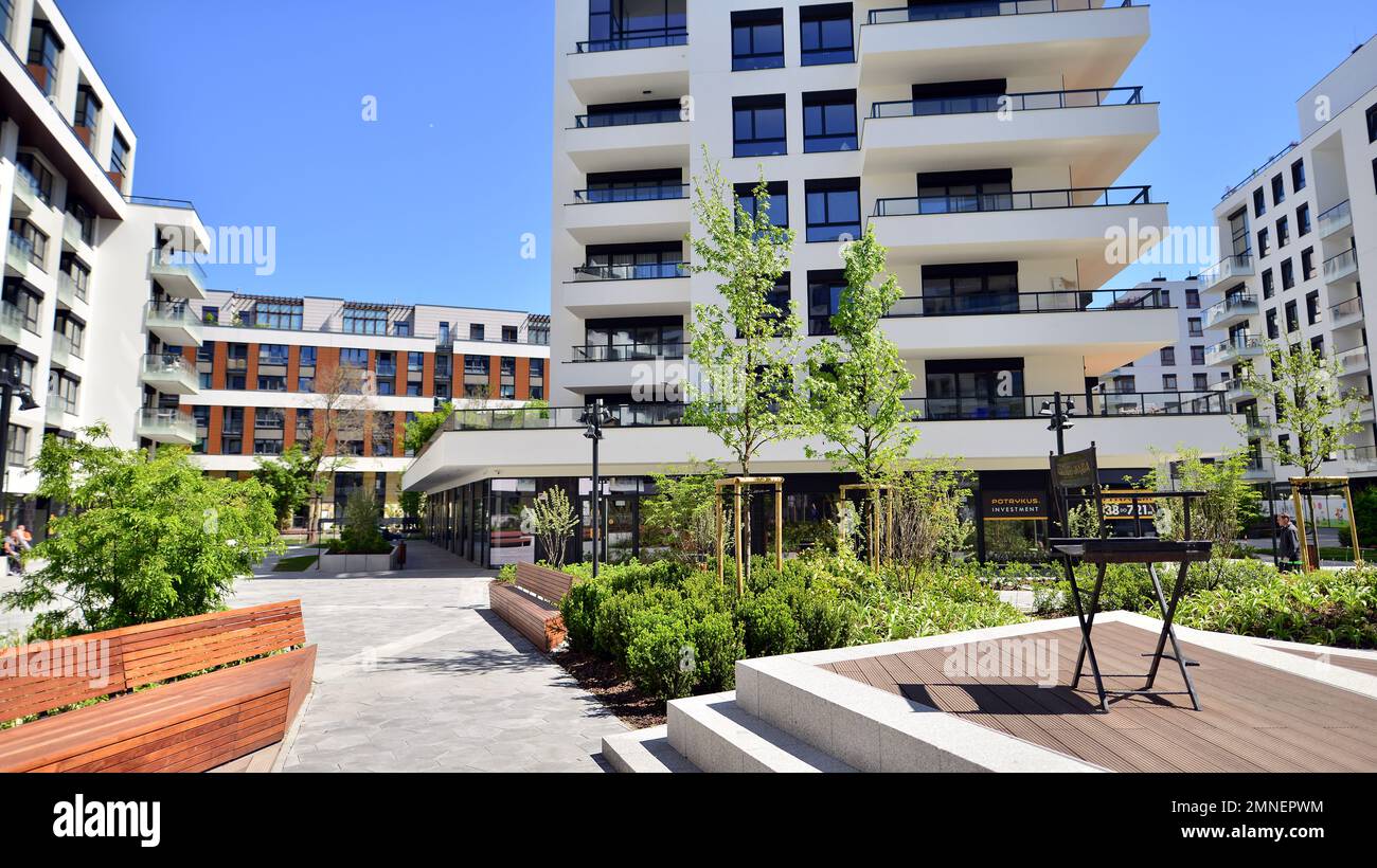 Futuristic square architecture of apartment building. Real estate with ...