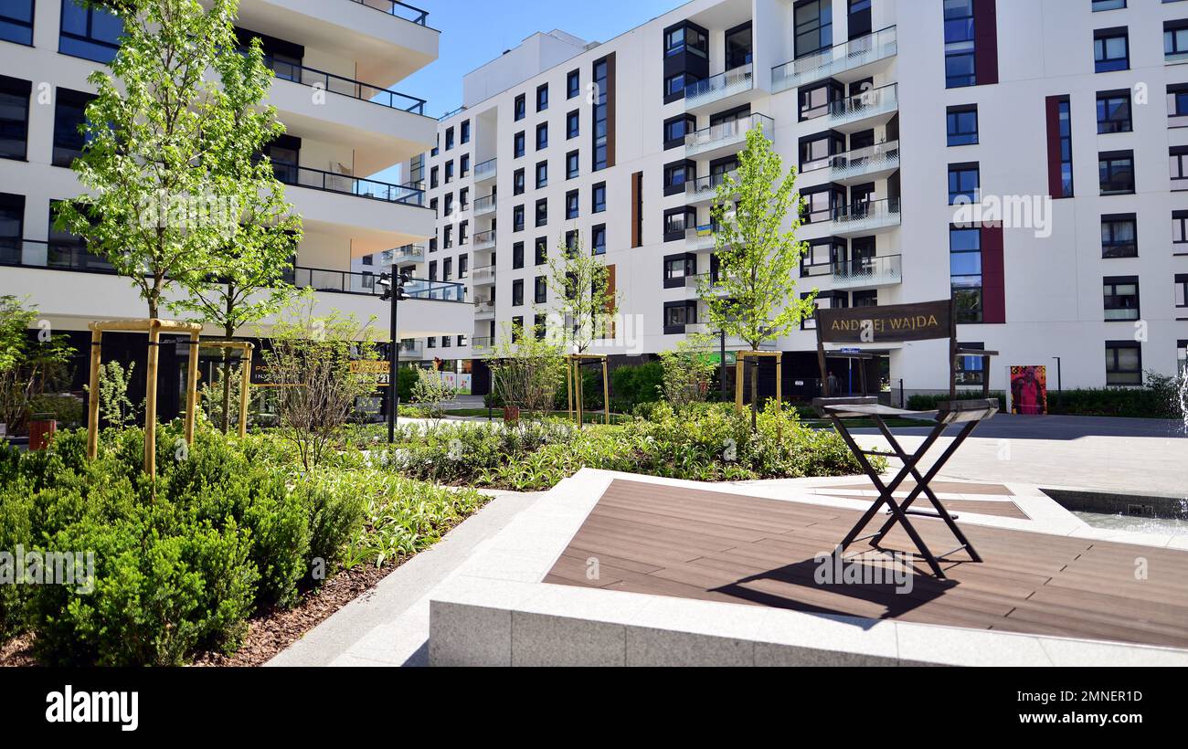 Futuristic square architecture of apartment building. Real estate with ...