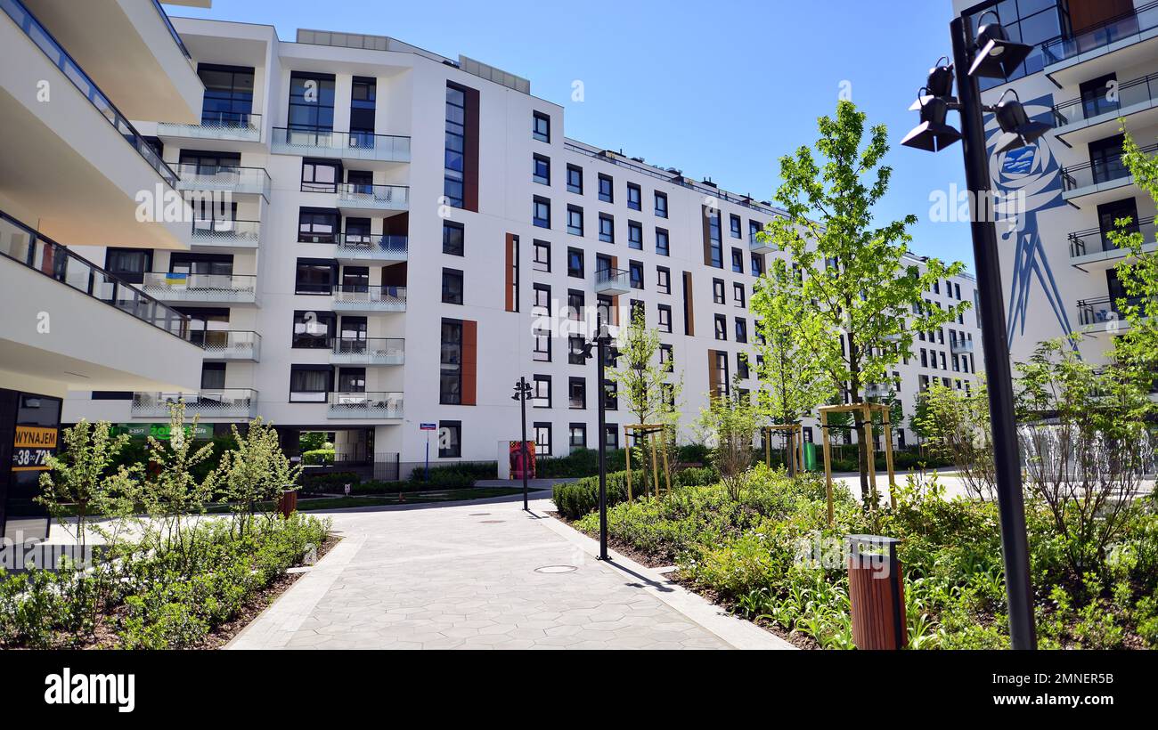 Futuristic square architecture of apartment building. Real estate with ...