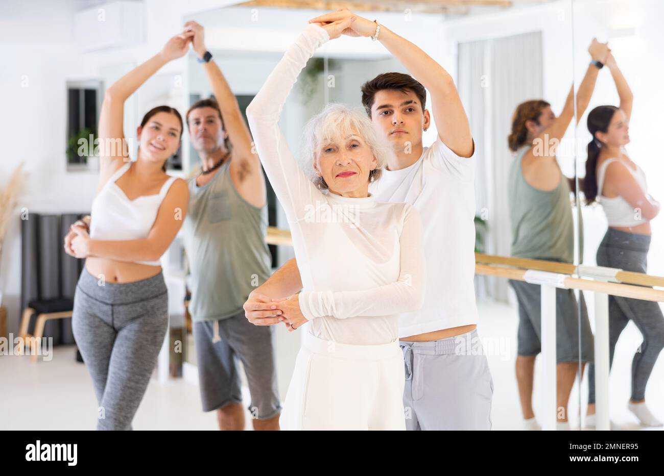 Young women dancing in front of mirror hi-res stock photography and ...