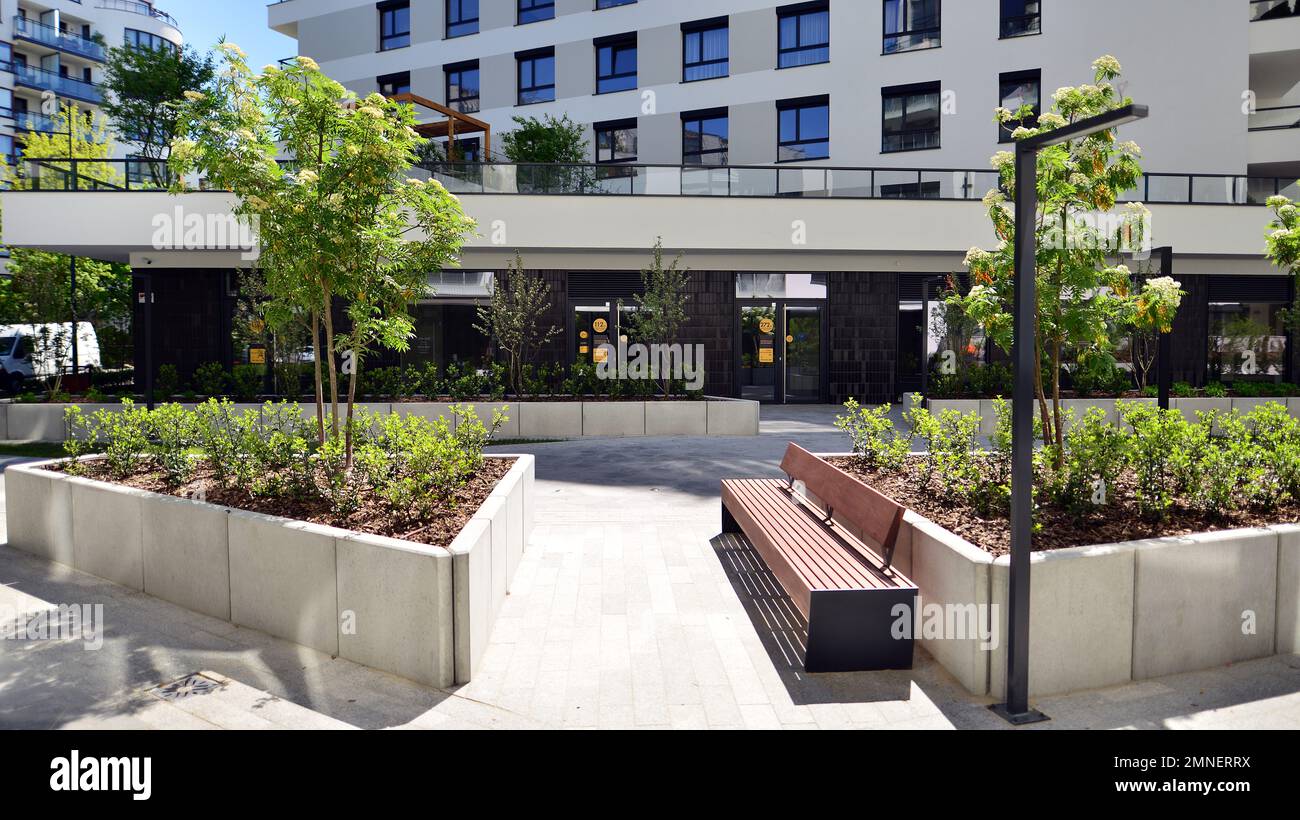 Futuristic square architecture of apartment building. Real estate with ...