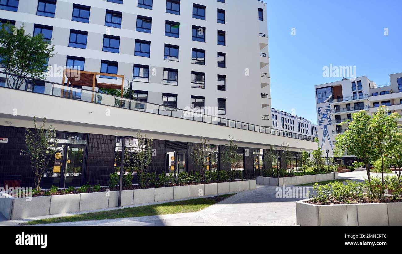 Futuristic square architecture of apartment building. Real estate with ...