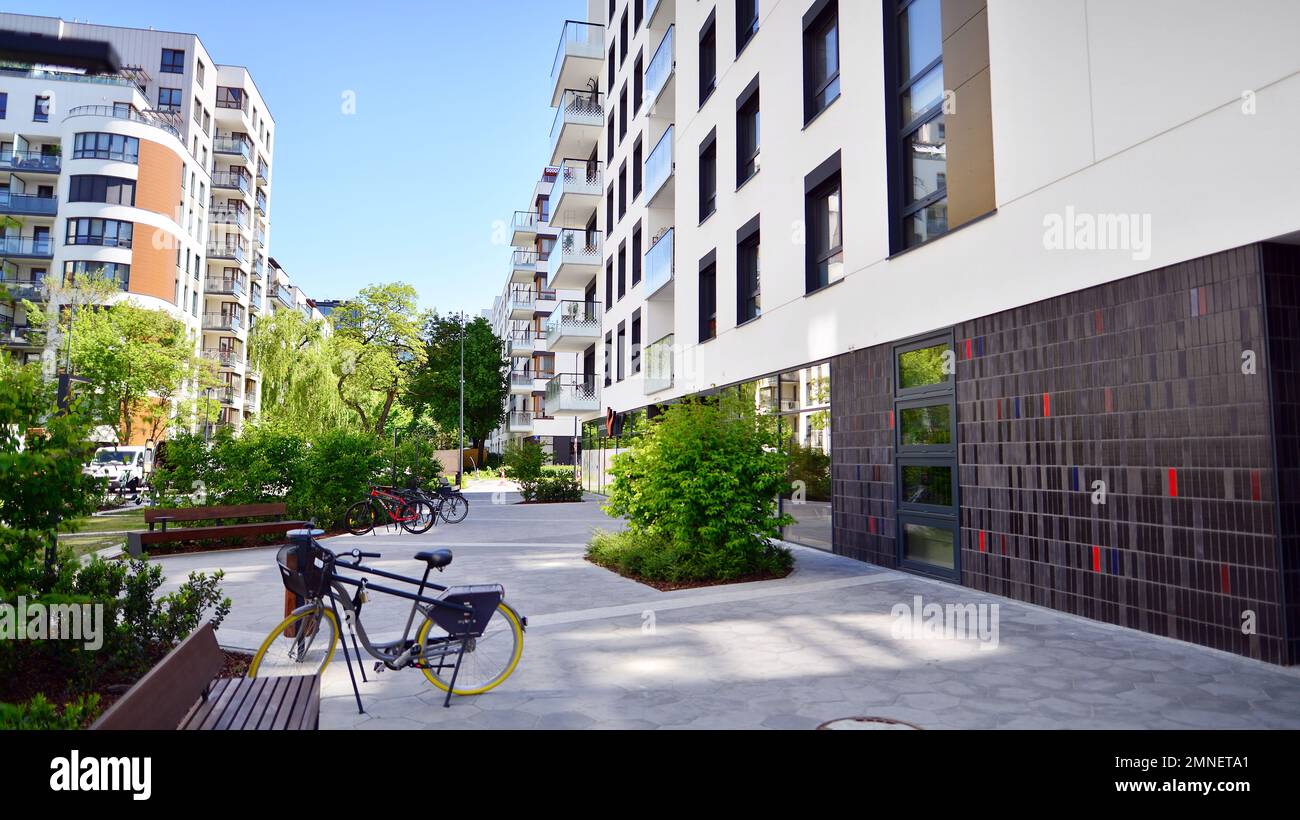 Futuristic square architecture of apartment building. Real estate with ...