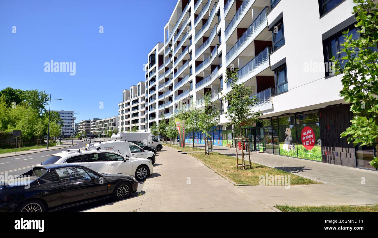 Futuristic square architecture of apartment building. Real estate with ...