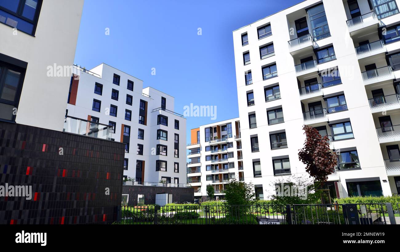 Futuristic square architecture of apartment building. Real estate with ...