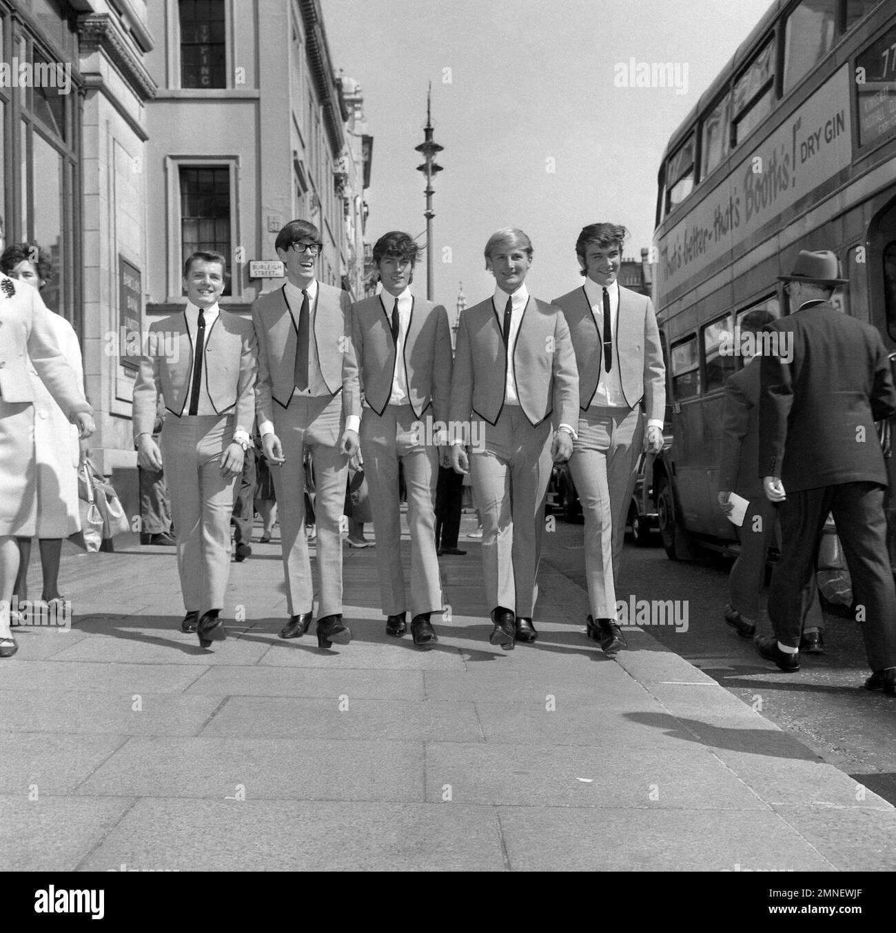 Pictured walking down the Strand in London, on Sept. 1, 1964, are left ...