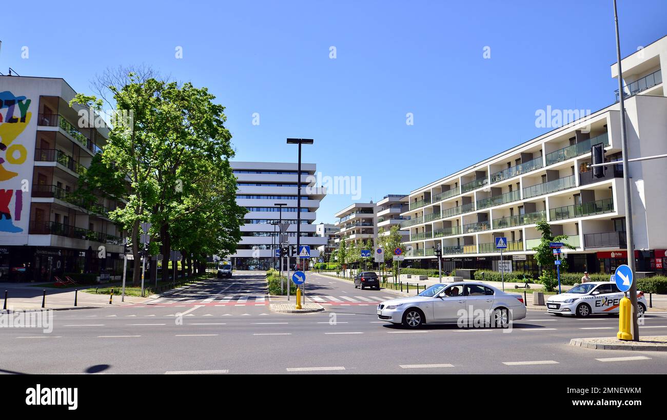 Futuristic square architecture of apartment building. Real estate with ...