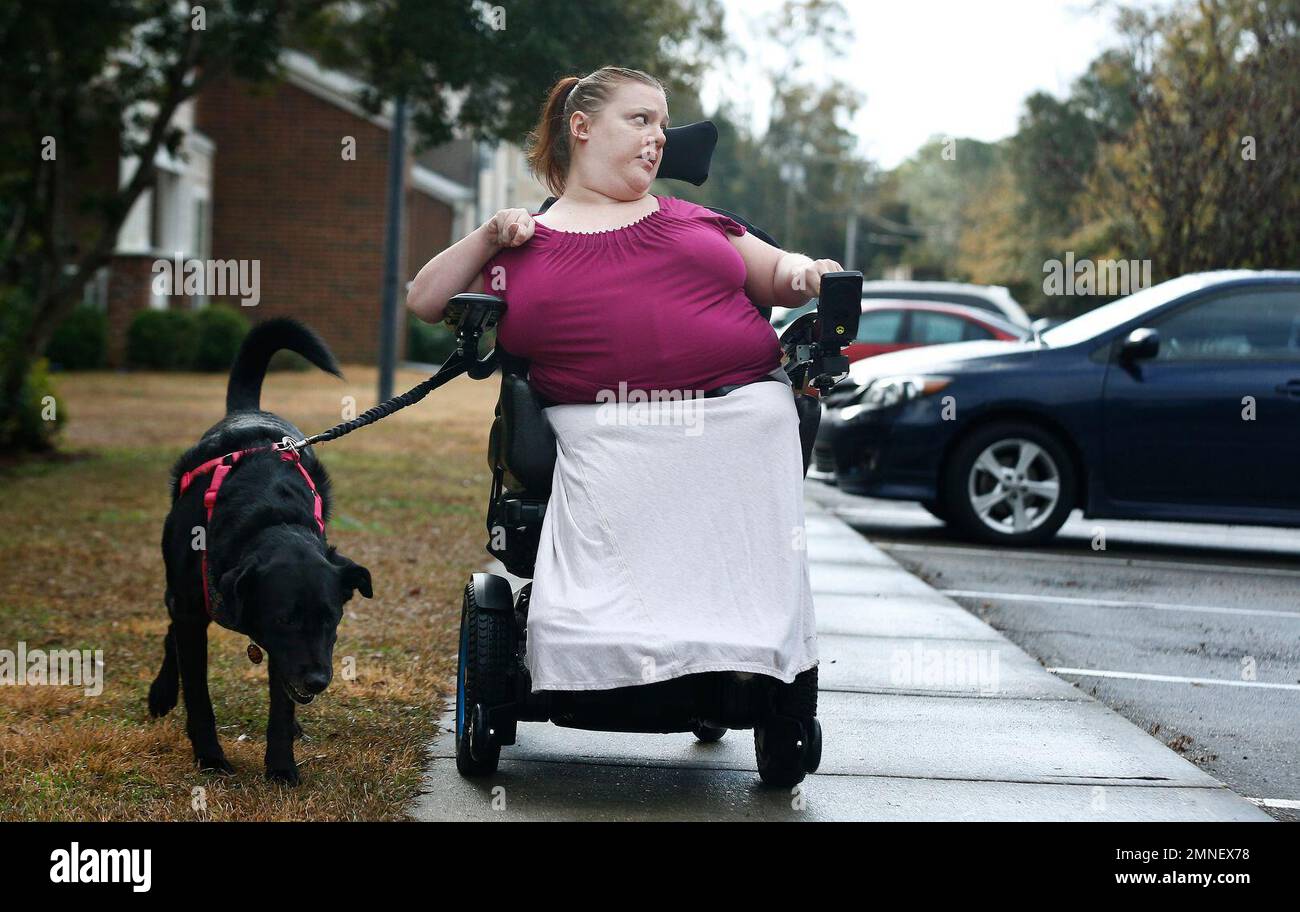 Andrea Chancey spends some time outside of her apartment complex to ...