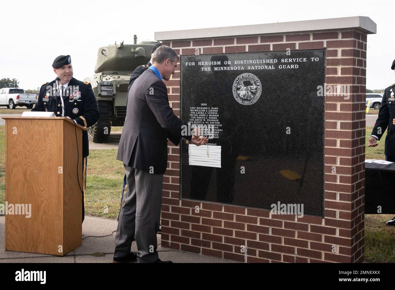 Maj. Gen. (Ret.) Neal G. Loidolt removes the cover from his name ...