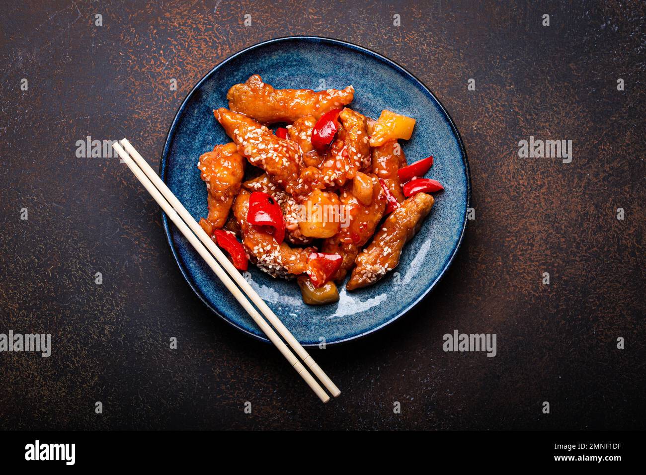 Chinese traditional wok dish sweat and sour deep fried chicken with ...