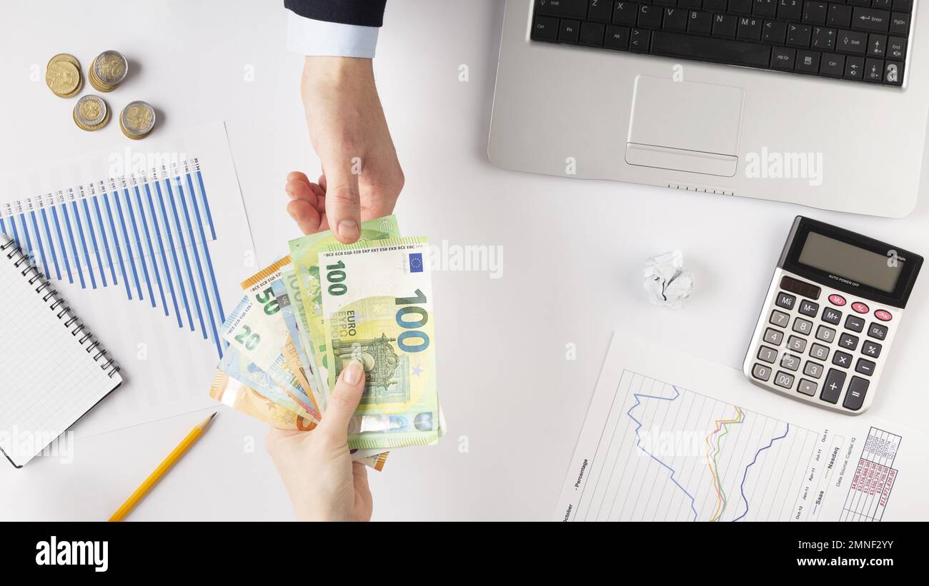 People exchanging money hi-res stock photography and images - Alamy