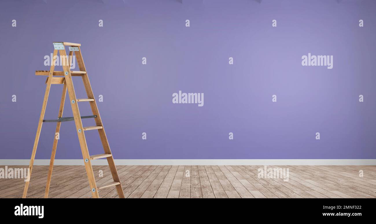 Composition of wooden ladder on wooden boards with purple wall and copy ...