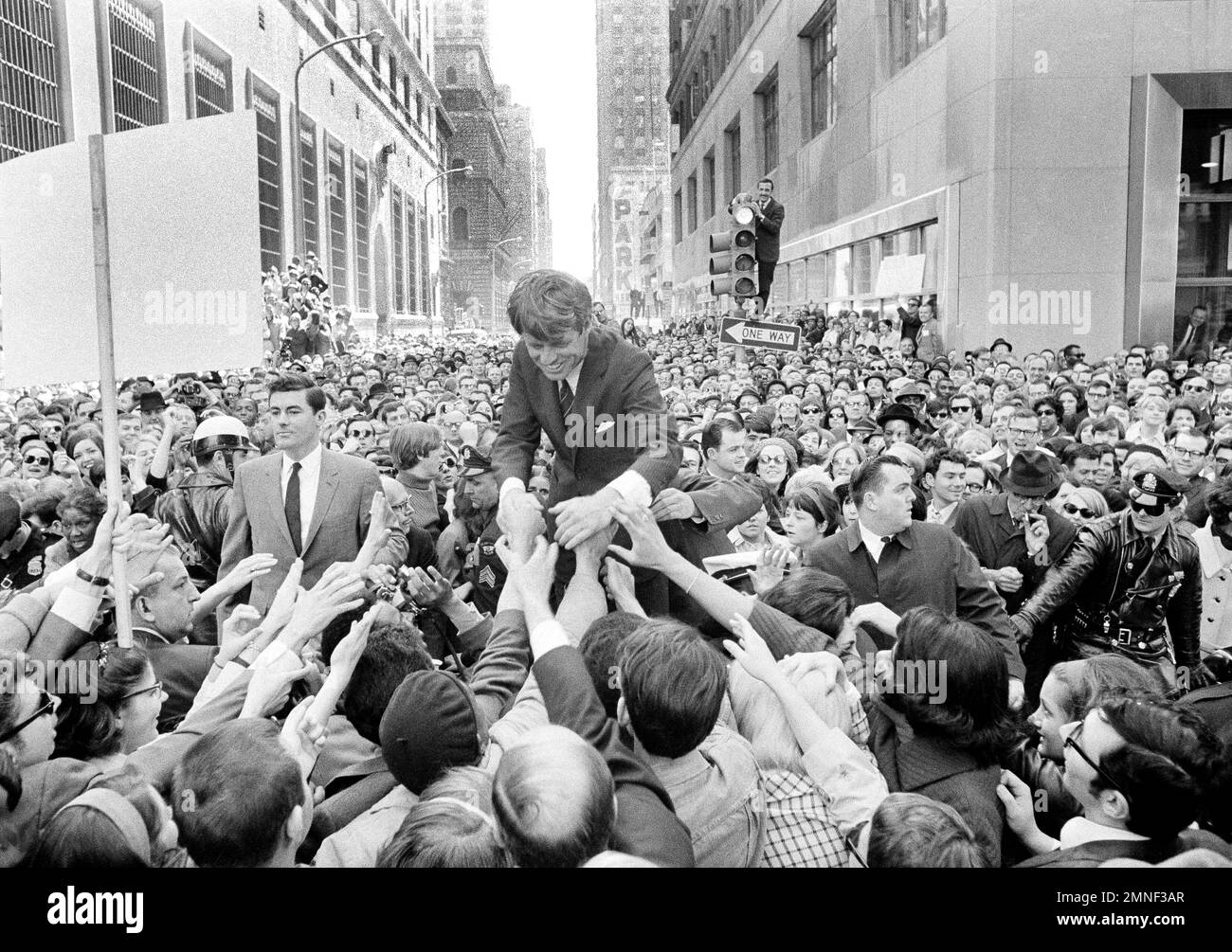 Presidential candidate Sen. Robert F. Kennedy, surrounded by hundreds ...