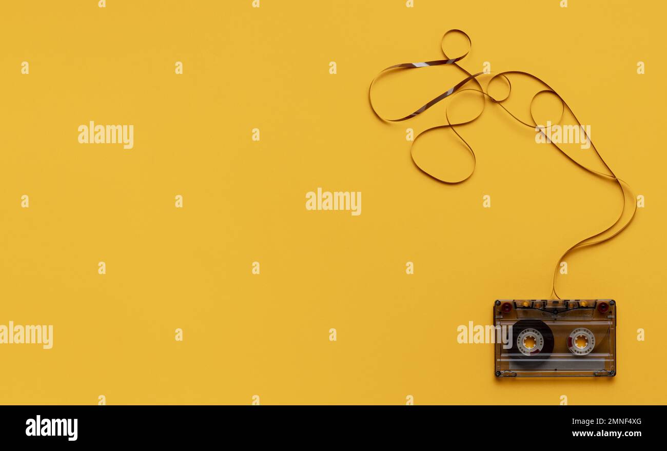 cassette tape yellow background. High resolution photo Stock Photo - Alamy