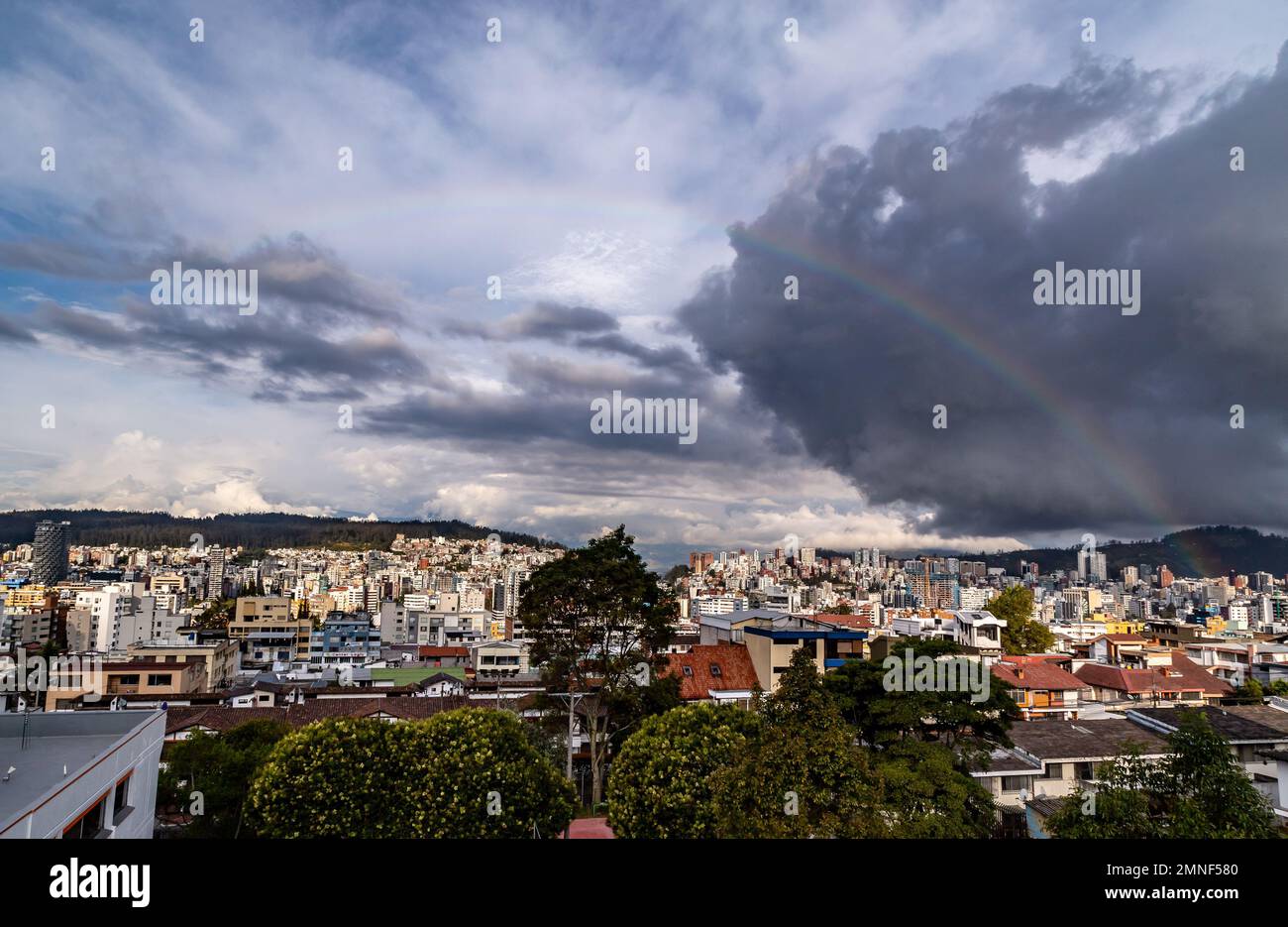 Sunny and rainy afternoon of a unique summer in the city of Quito ...