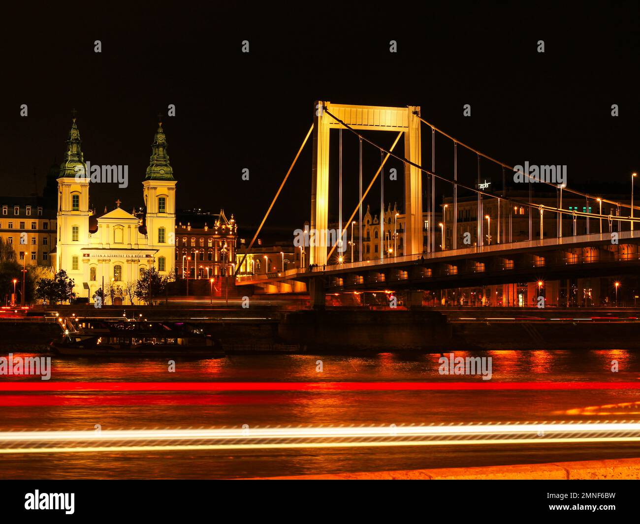 A church and the Elizabeth Bridge Stock Photo - Alamy