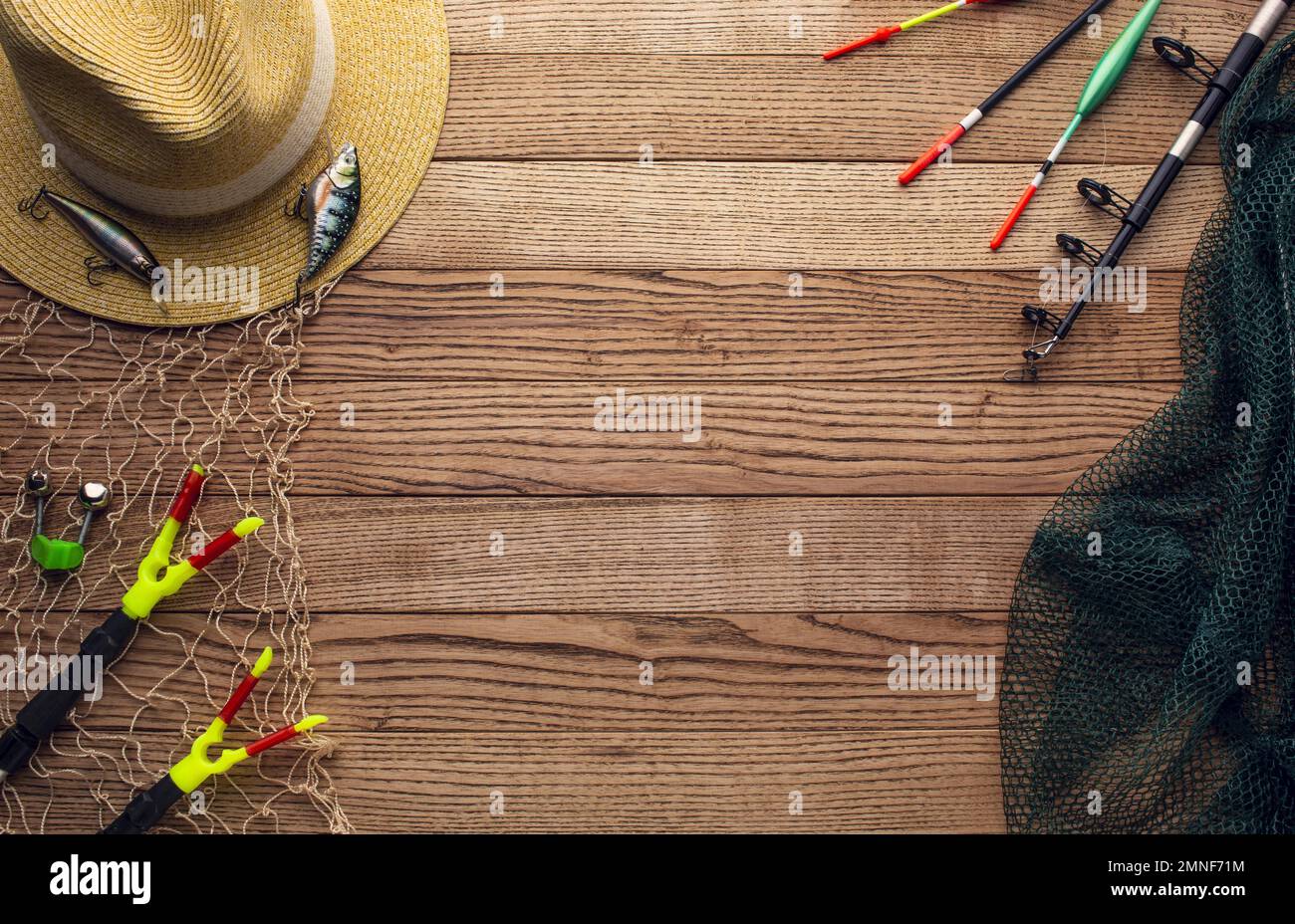 top view colorful fishing essentials with net hat. Resolution and high ...