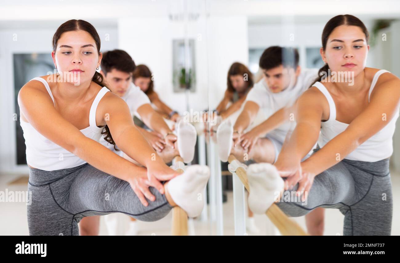 Sporty female doing barre workout hi-res stock photography and images ...