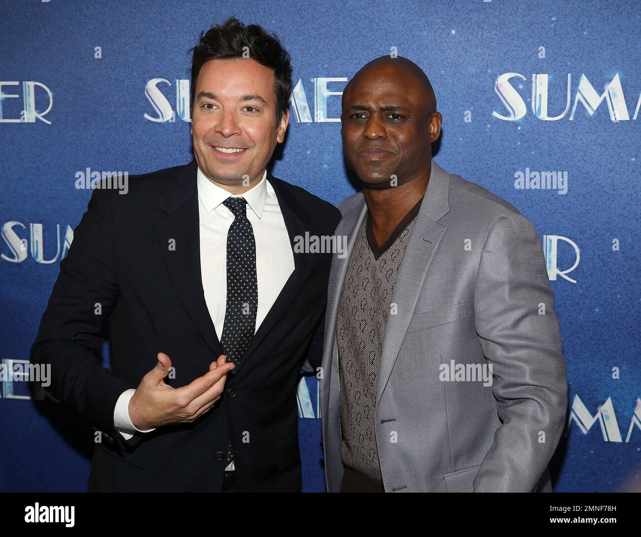 Television host Jimmy Fallon and actor Wayne Brady attend the opening ...