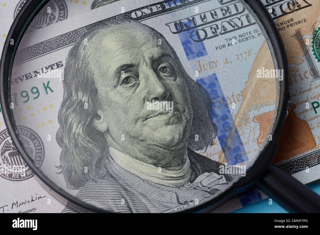 Fragment of one hundred dollar bill with a portrait of Benjamin ...