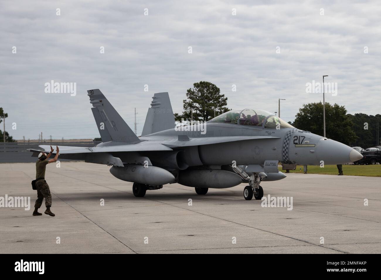 A U.S. Marine with Marine Fighter Attack Squadron (VMFA) 312, Marine ...