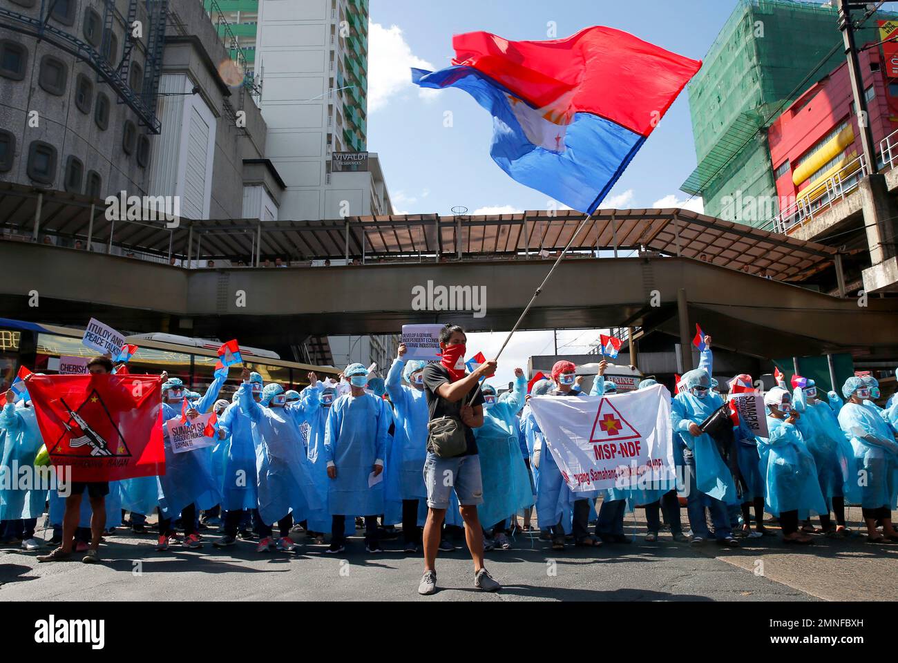Masked members of the outlawed National Democratic Front of the ...
