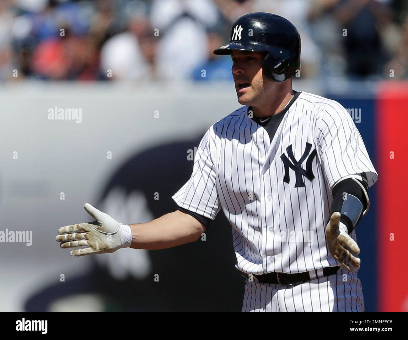 New York Yankees' Austin Romine reacts after hitting a two-run double ...