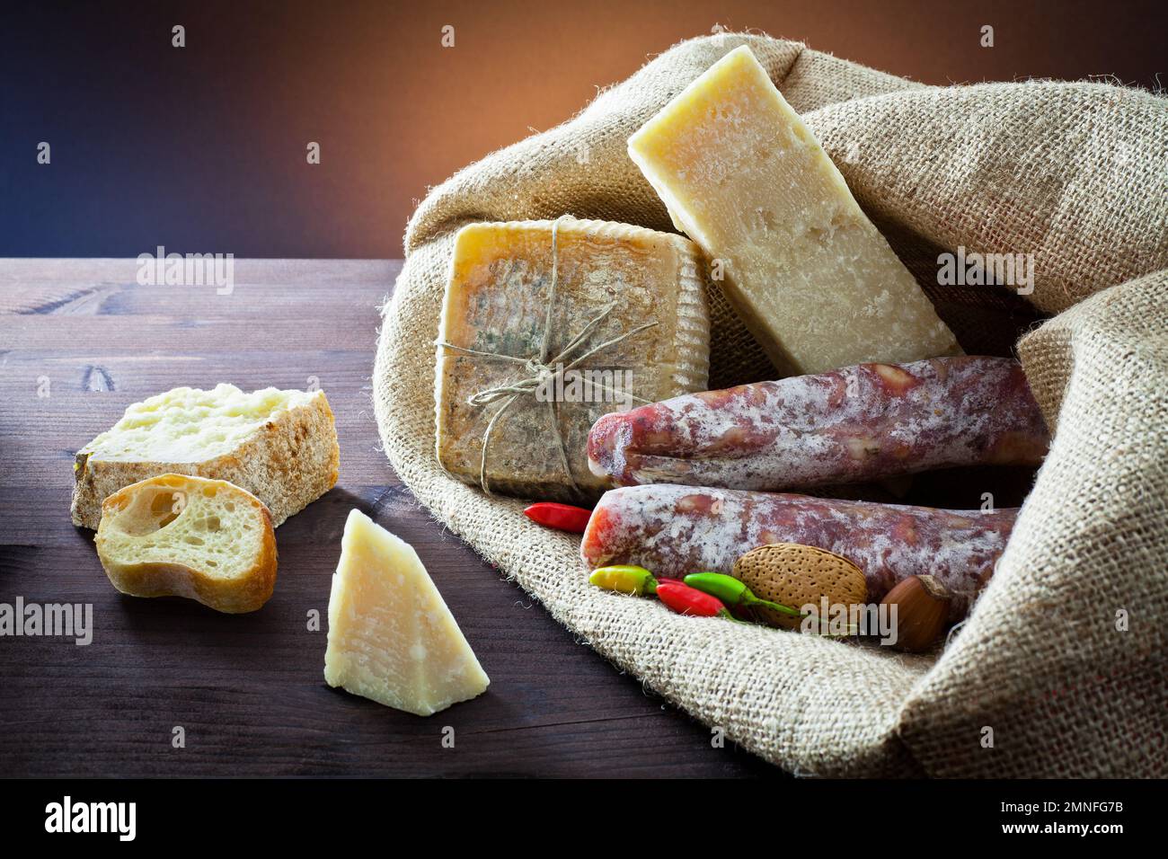 Typical Italian appetizer. Assortment of cheese, salami meats and hot ...
