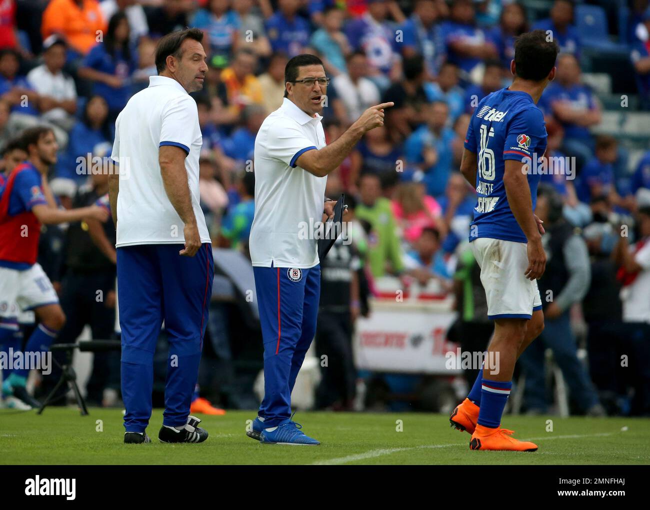 Cruz Azul coach Pedro Miguel Faria Caixinha, center, gives instructions ...
