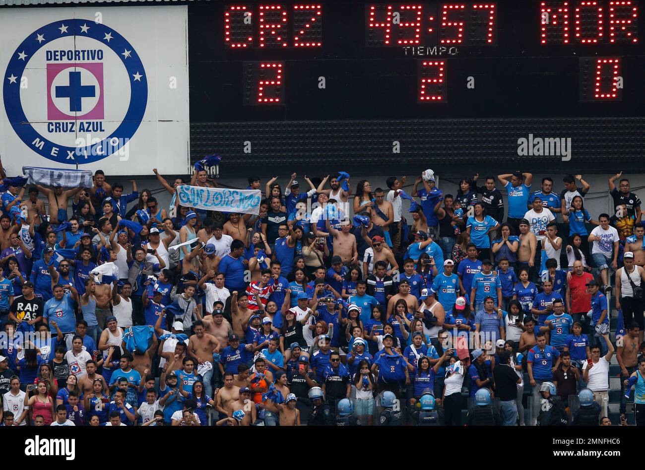 Cruz Azul fans cheer after their team scored against Morelia during a ...