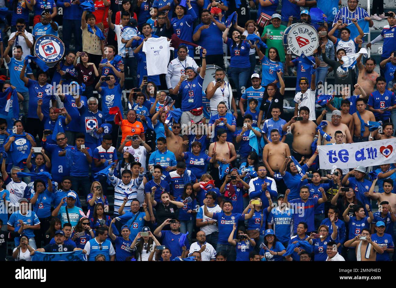 Cruz Azul fans cheer after their team scored against Morelia during a ...