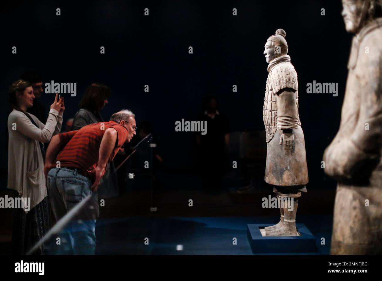 Visitors browse the Terracotta Army exhibit at the Cincinnati Art ...