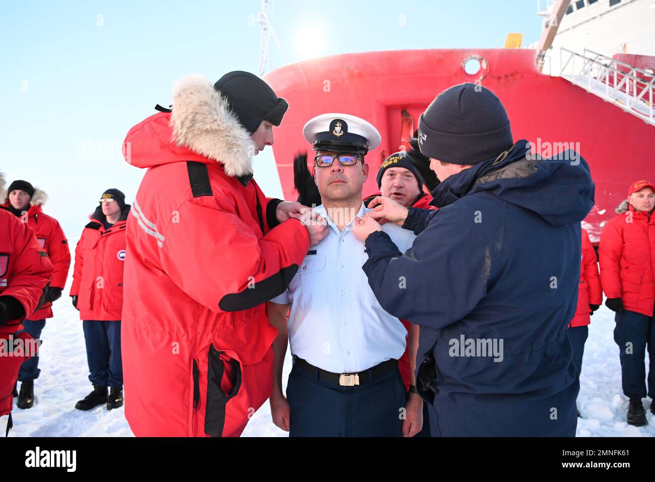 Crewmembers of the USCGC Healy (WAGB 20) hold an advancement ceremony ...