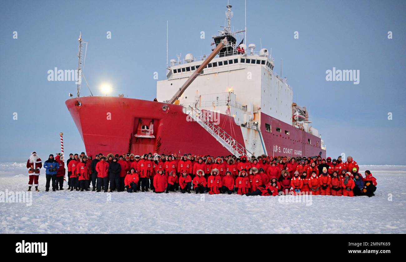 USCGC Healy (WAGB 20) crew members and the science team gather for a ...