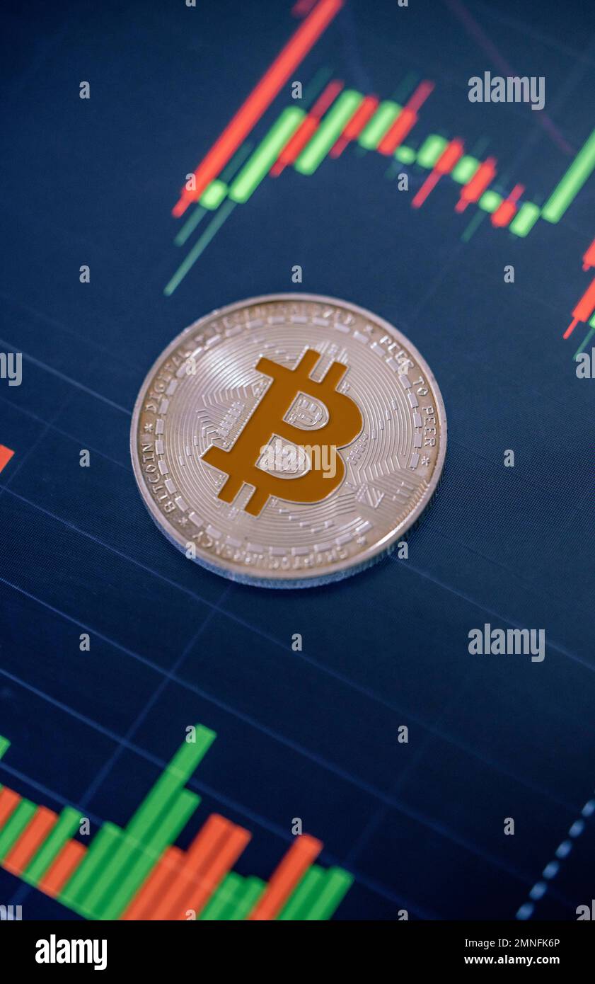 Silver Bitcoin cryptocurrency with candle stick graph chart and digital ...